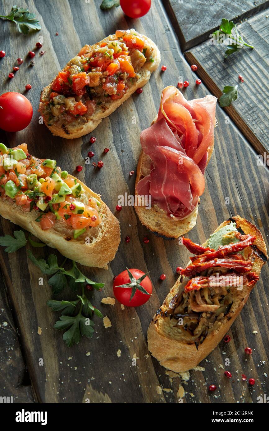 Italian crostini with various toppings Stock Photo - Alamy