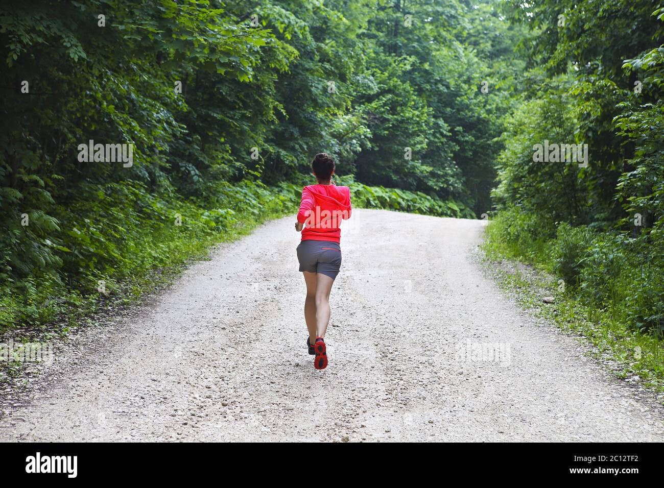 Woman running off road hi-res stock photography and images - Alamy