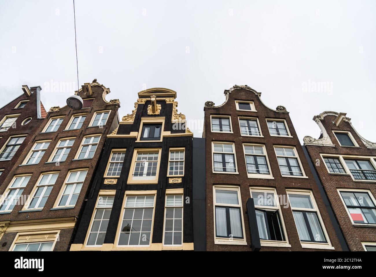 Traditional Dutch architecture colorful houses in Amsterdam ...