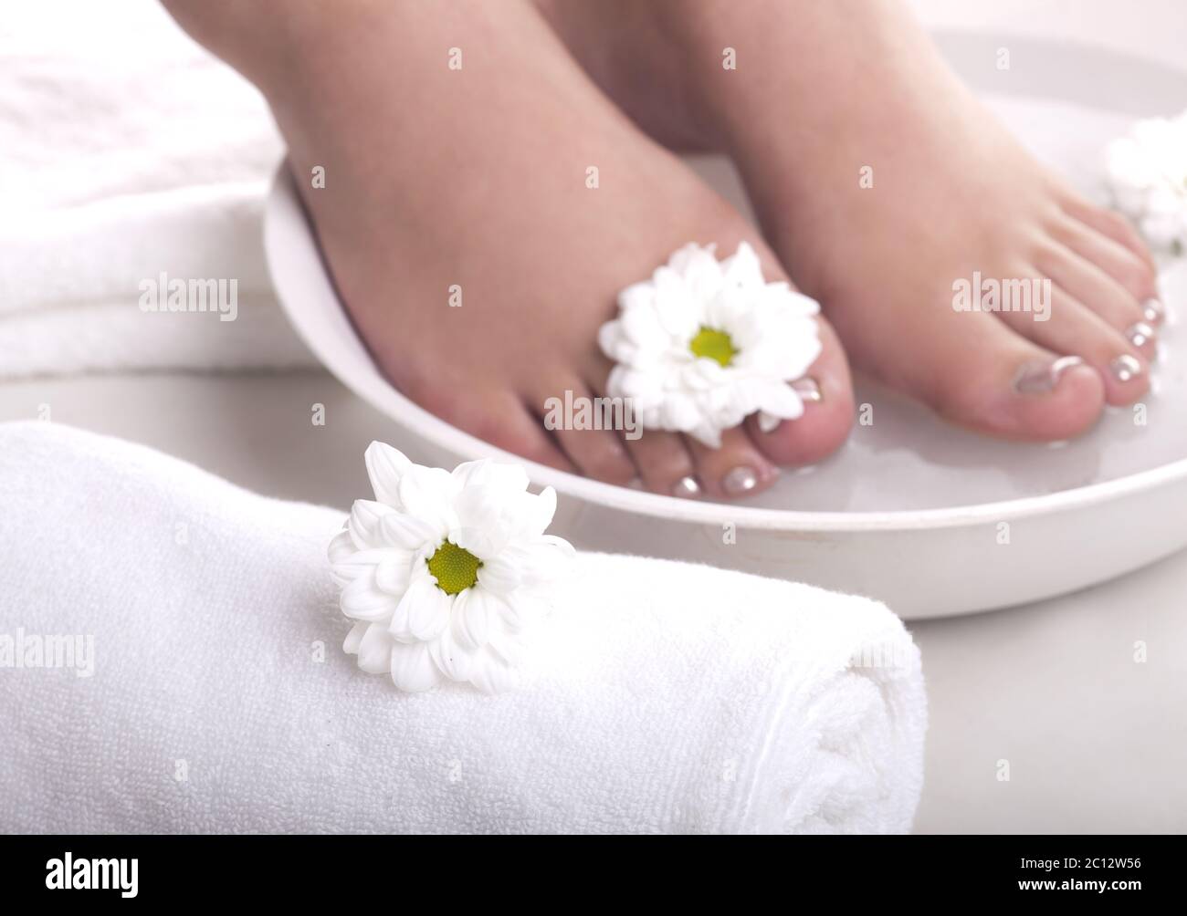 Foot spa on white background Stock Photo - Alamy
