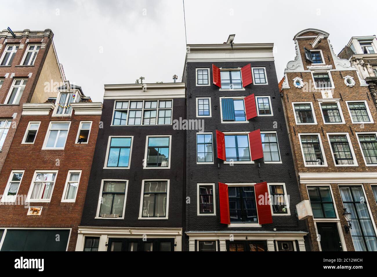 Traditional Dutch architecture colorful houses in Amsterdam ...