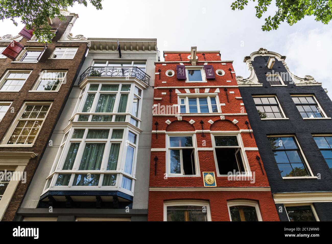 Traditional Dutch architecture colorful houses in Amsterdam ...