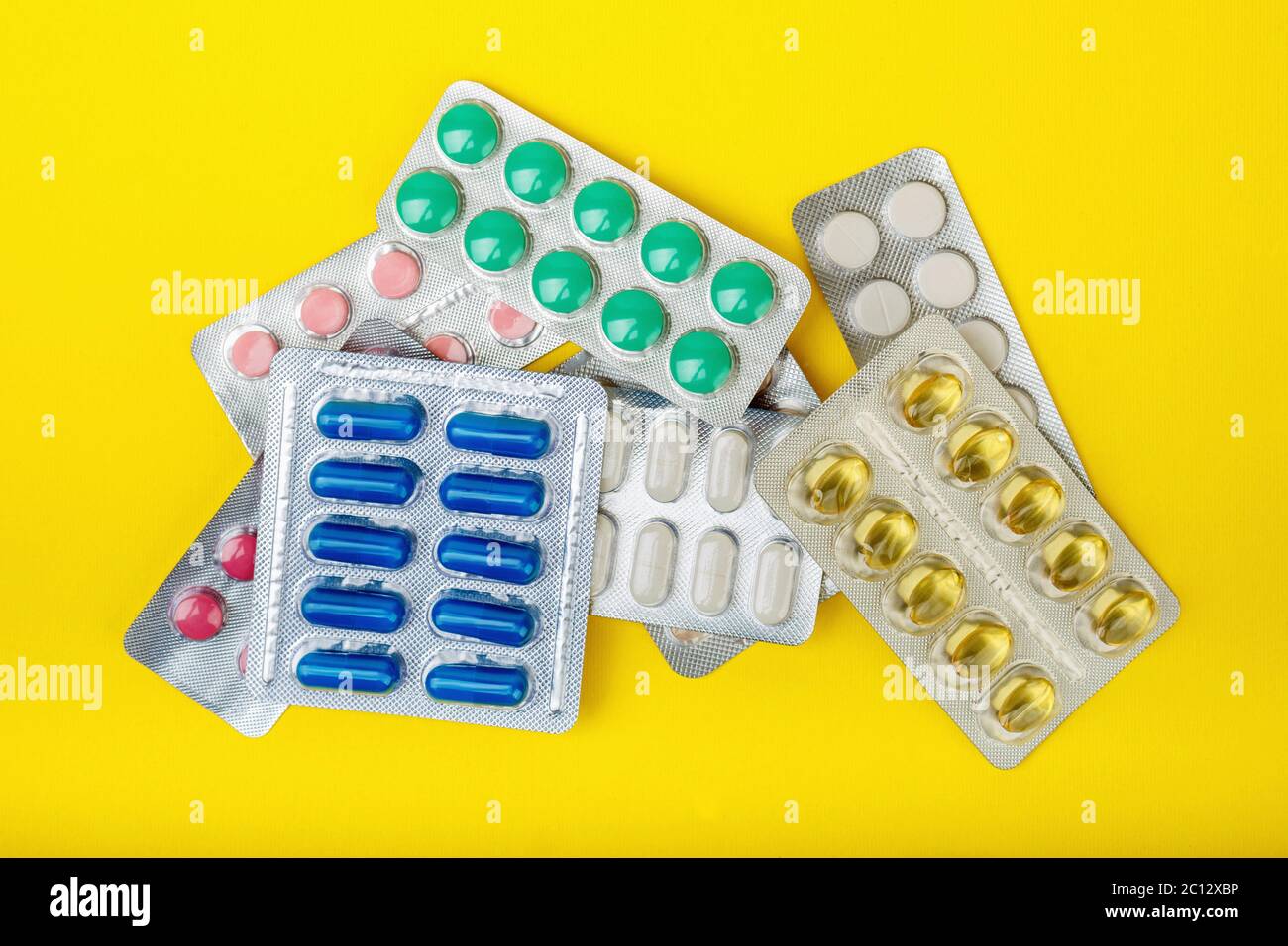 group of pharmaceutical medication and medicine pills in packs on ...