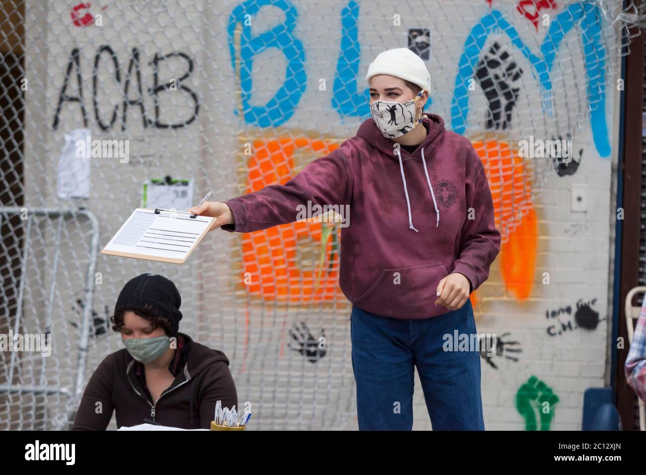 Young protesters register voters at the abandoned Seattle Police ...
