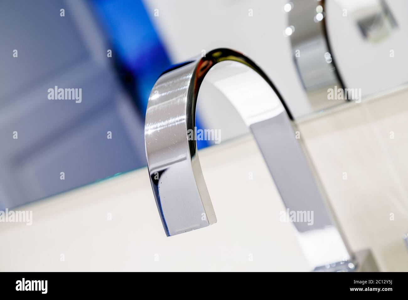 modern stainless steel faucet knob Stock Photo - Alamy