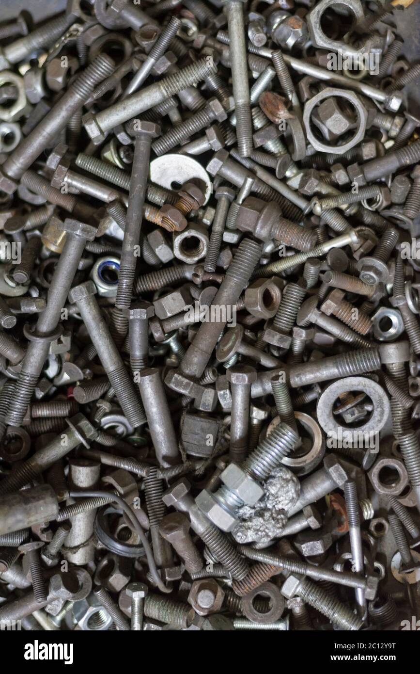 Many old bolts and nuts in the garage Stock Photo - Alamy