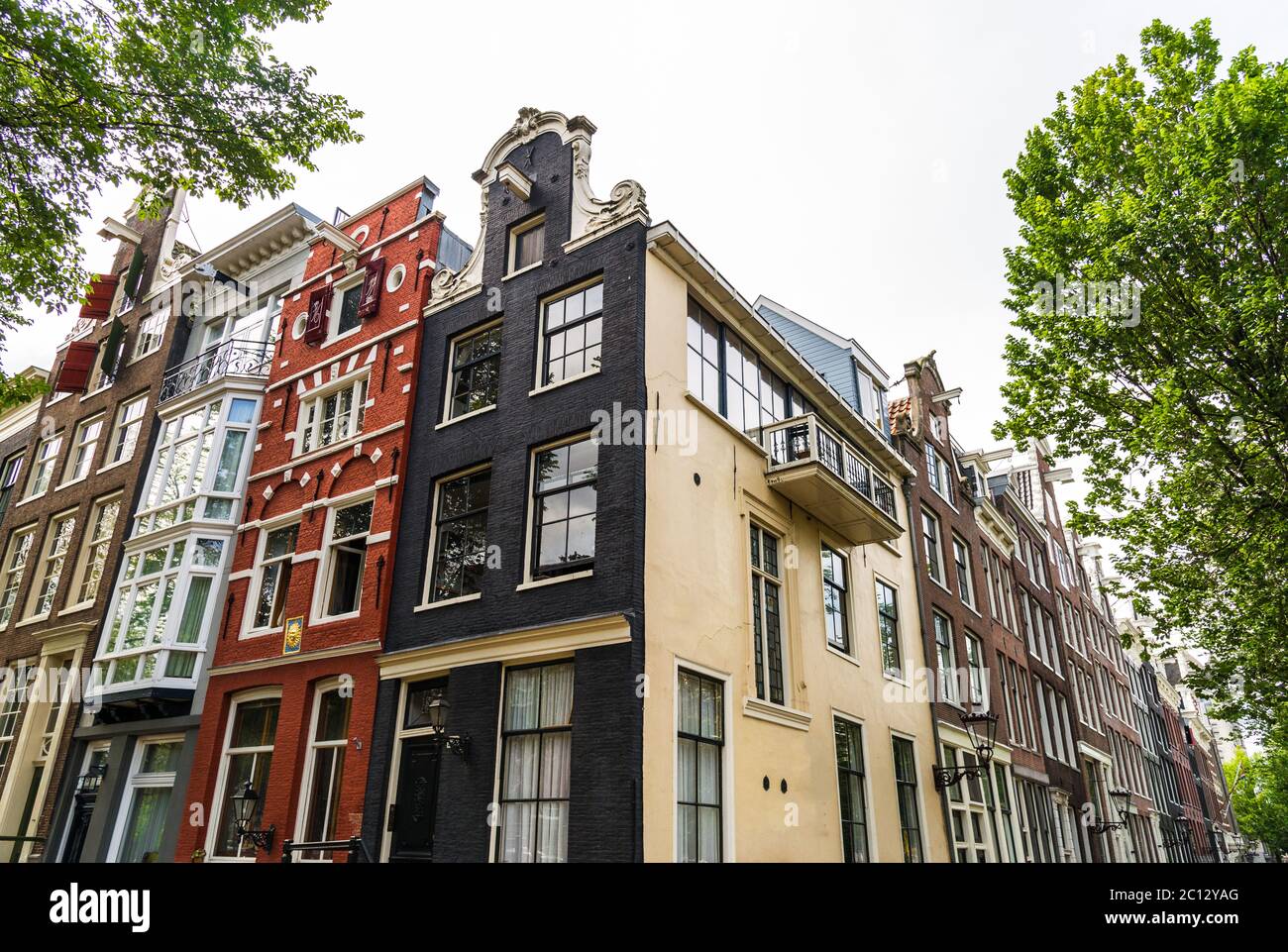Traditional Dutch architecture colorful houses in Amsterdam ...