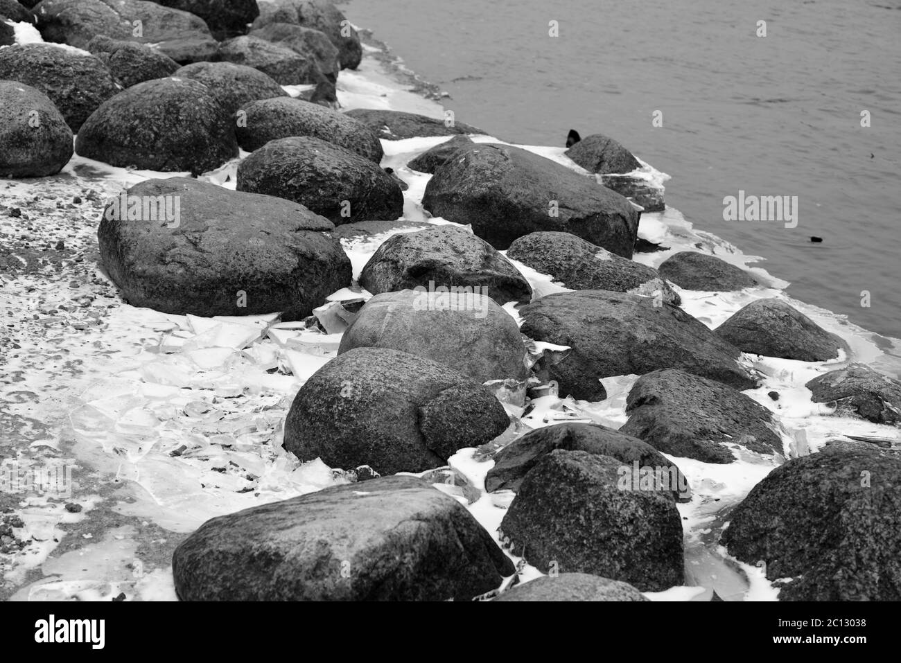 Granite stones on the bank of the river Stock Photo - Alamy
