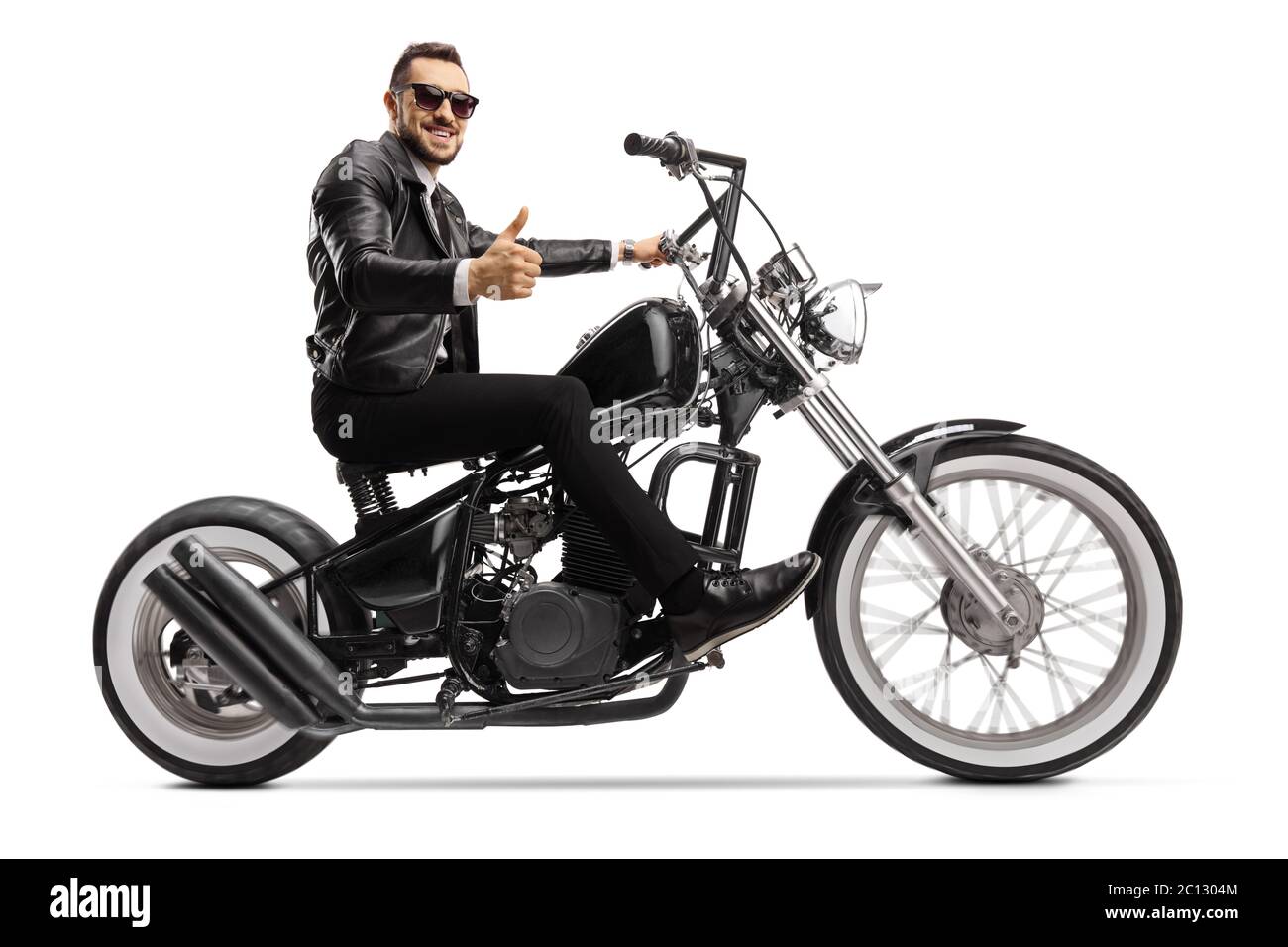 Biker on a custom chopper riding and showing thumbs up isolated on ...