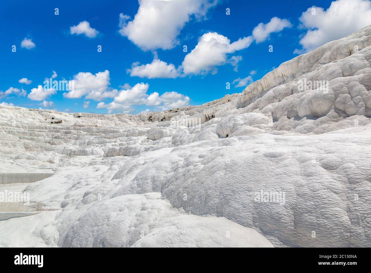 Travertine pools and terraces in Pamukkale, Turkey in a beautiful ...