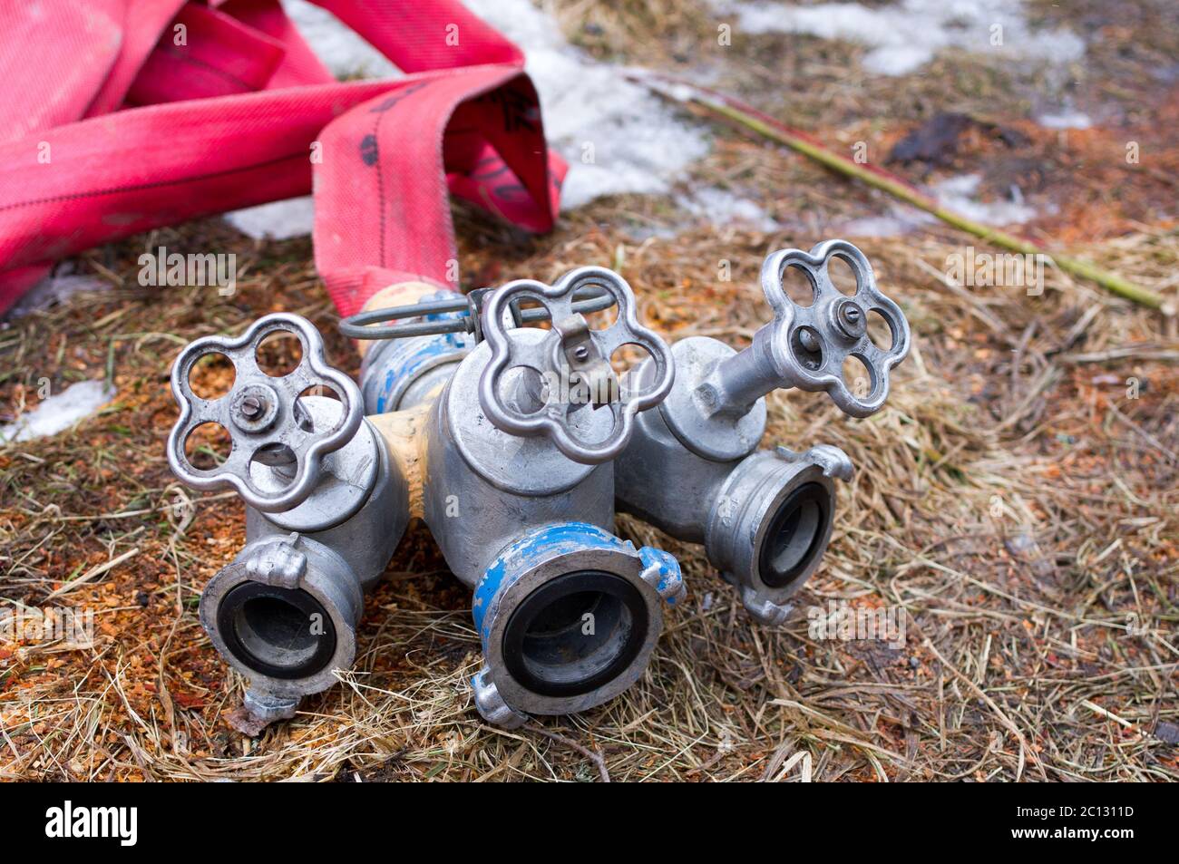 Fire Hydrant, three-valve, placed on the ground. Valves close Stock ...