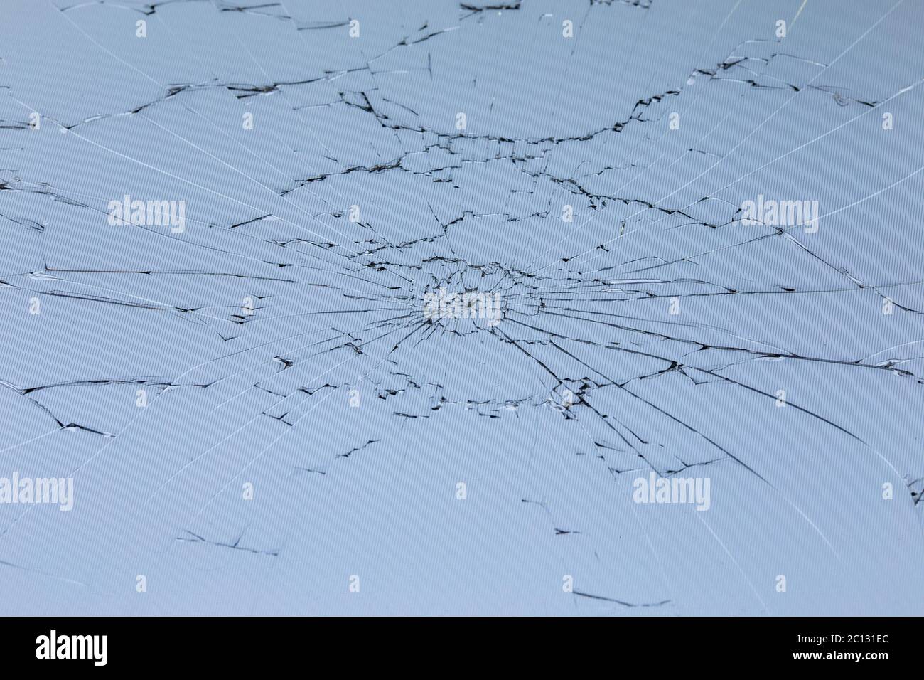 close-up view of slanted broken lcd screen with visible pixel grid and ...