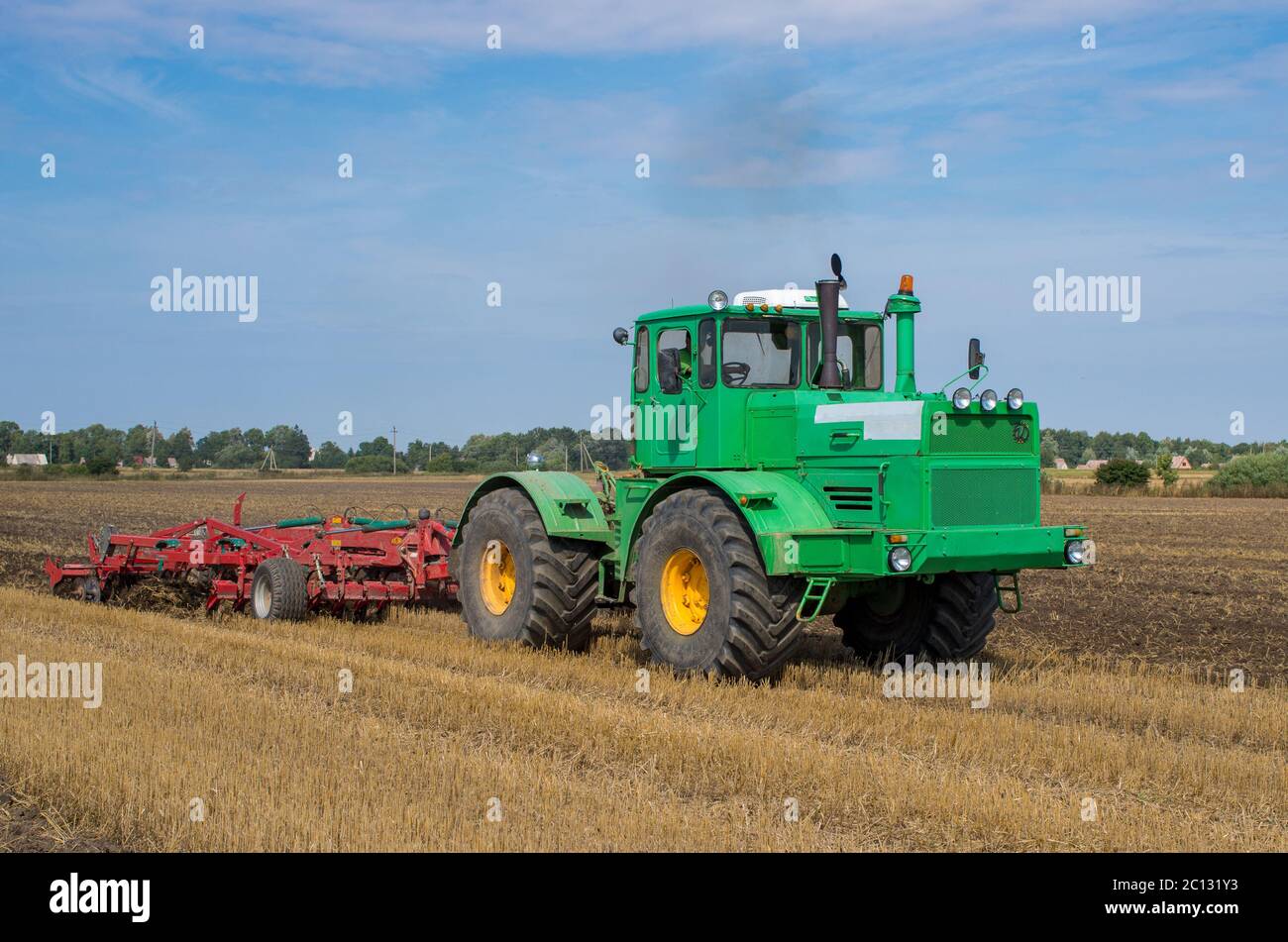 Tractor cultivating field hi-res stock photography and images - Alamy