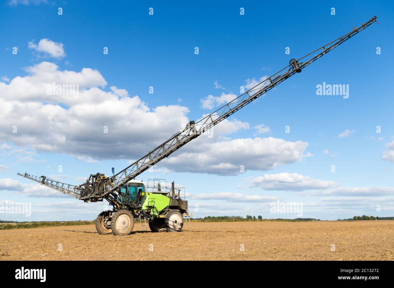 Self propelled sprayer in a Lithuanian field Stock Photo - Alamy