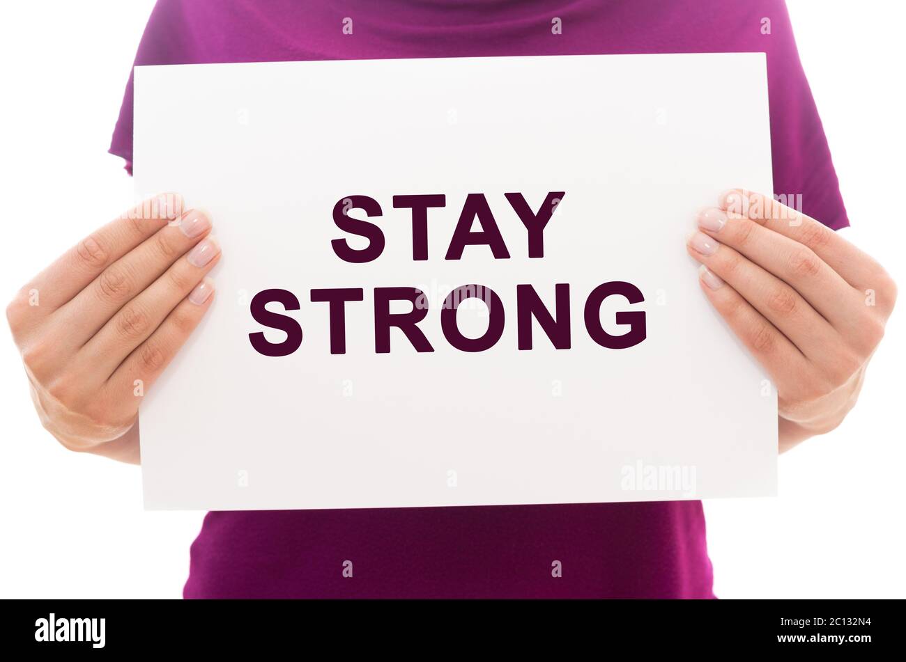 Girl holding white paper sheet with text Stay strong Stock Photo - Alamy