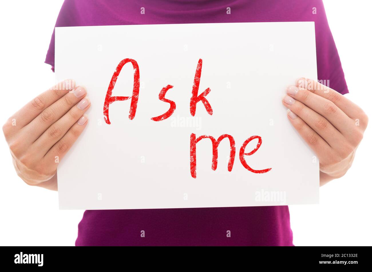 Girl holding white paper sheet with text Ask me! Stock Photo - Alamy