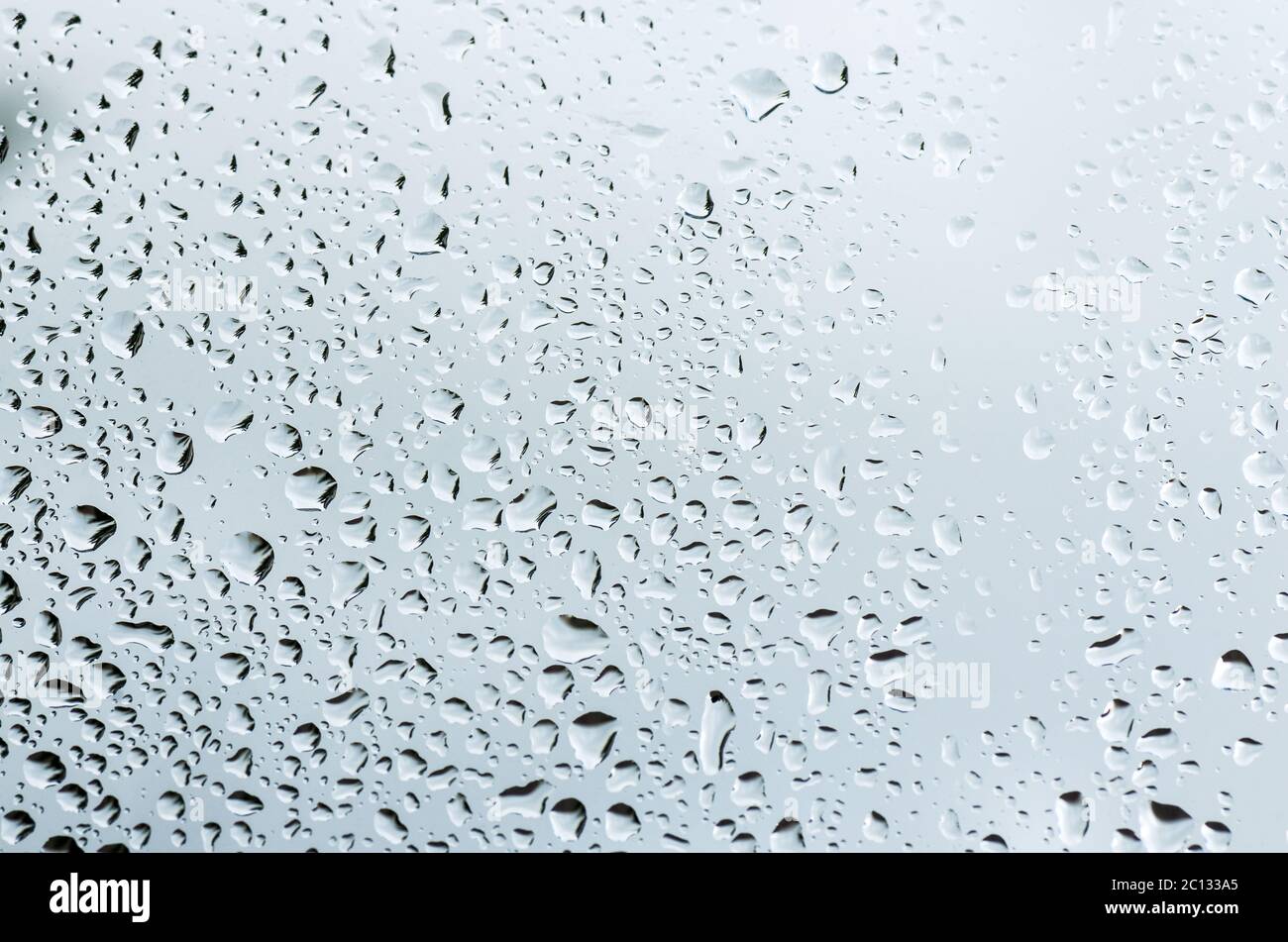 Rain water drops on windows glass Stock Photo - Alamy