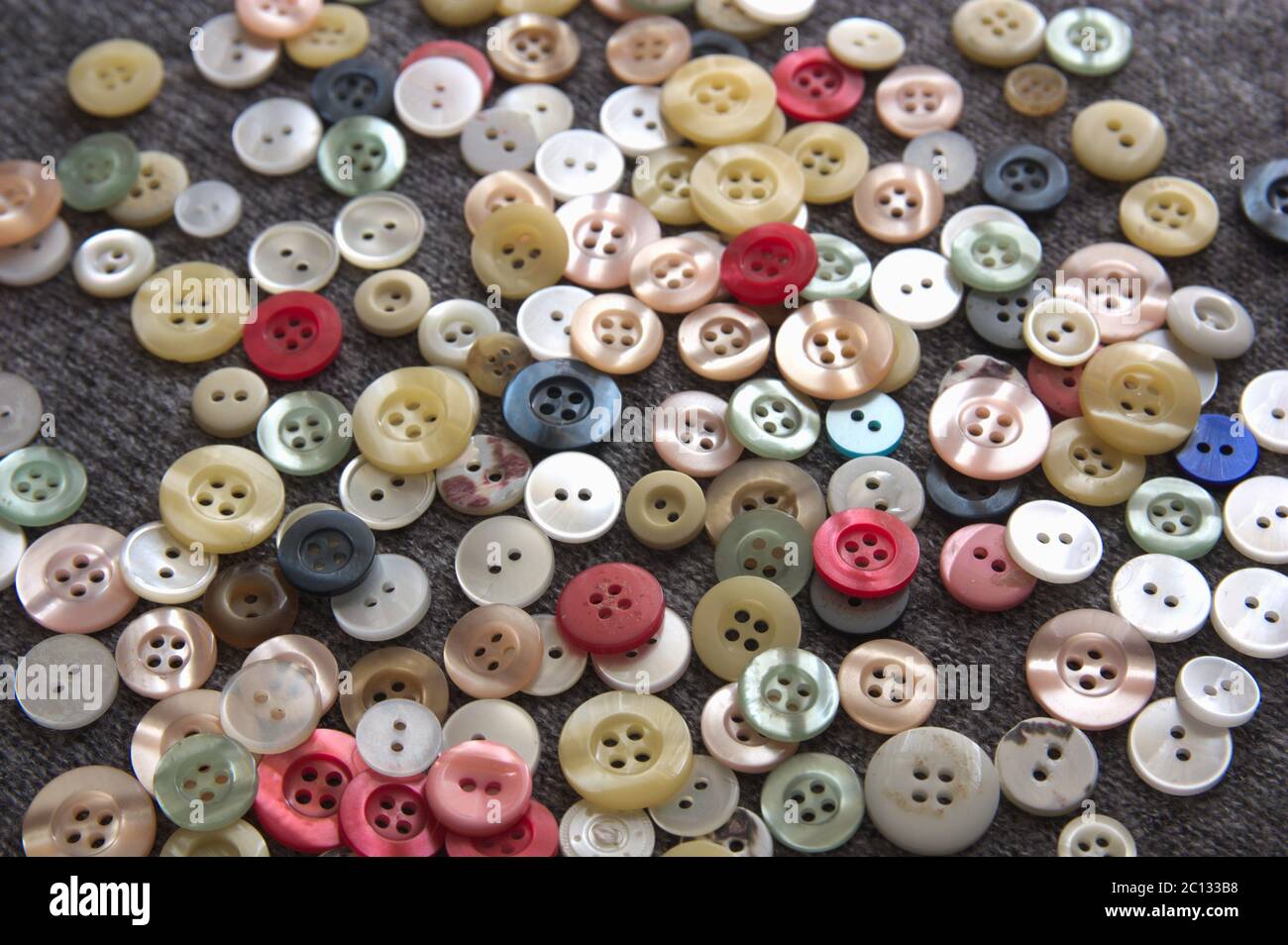 Image of a bunch of buttons of different shapes, colors and sizes ...