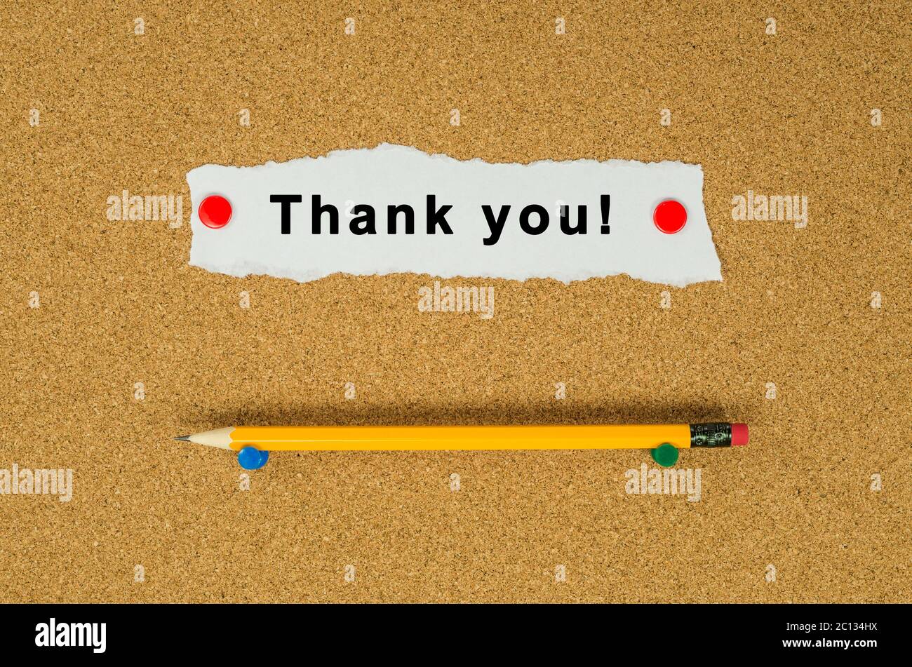 Thank you text note message pin on bulletin board Stock Photo - Alamy