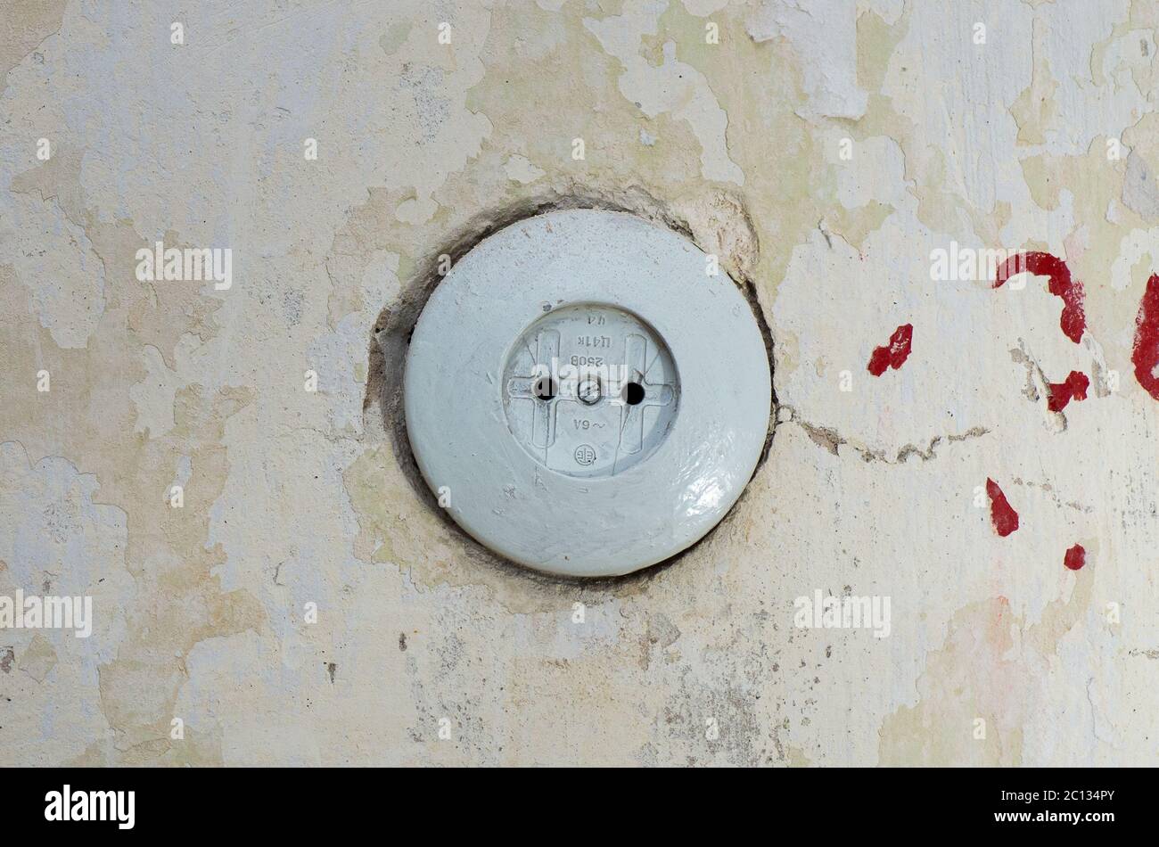 Old electric socket mounted in the wall Stock Photo - Alamy