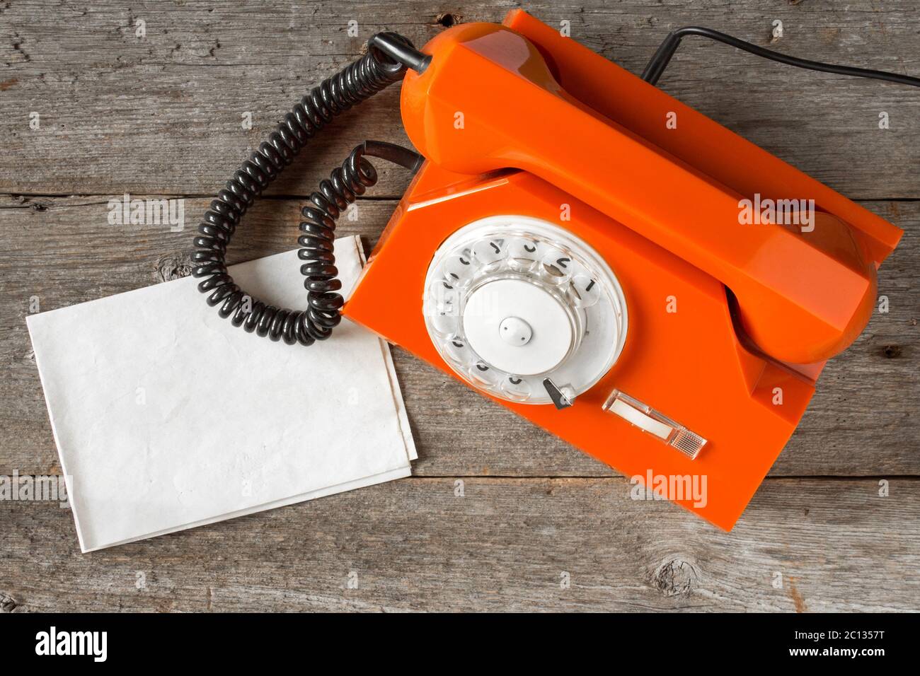 Rotary telephone and blank paper Stock Photo - Alamy