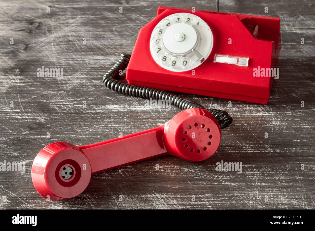 Red phone with rotary dial Stock Photo - Alamy