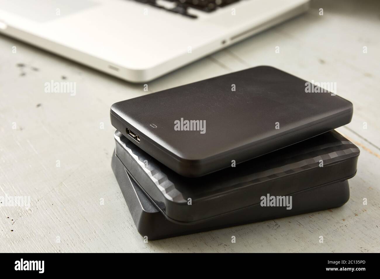 External Hard Disks and Laptop Keyboard Stock Photo - Alamy