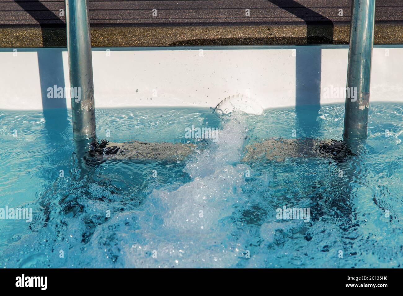 Swimming pool steps Stock Photo - Alamy