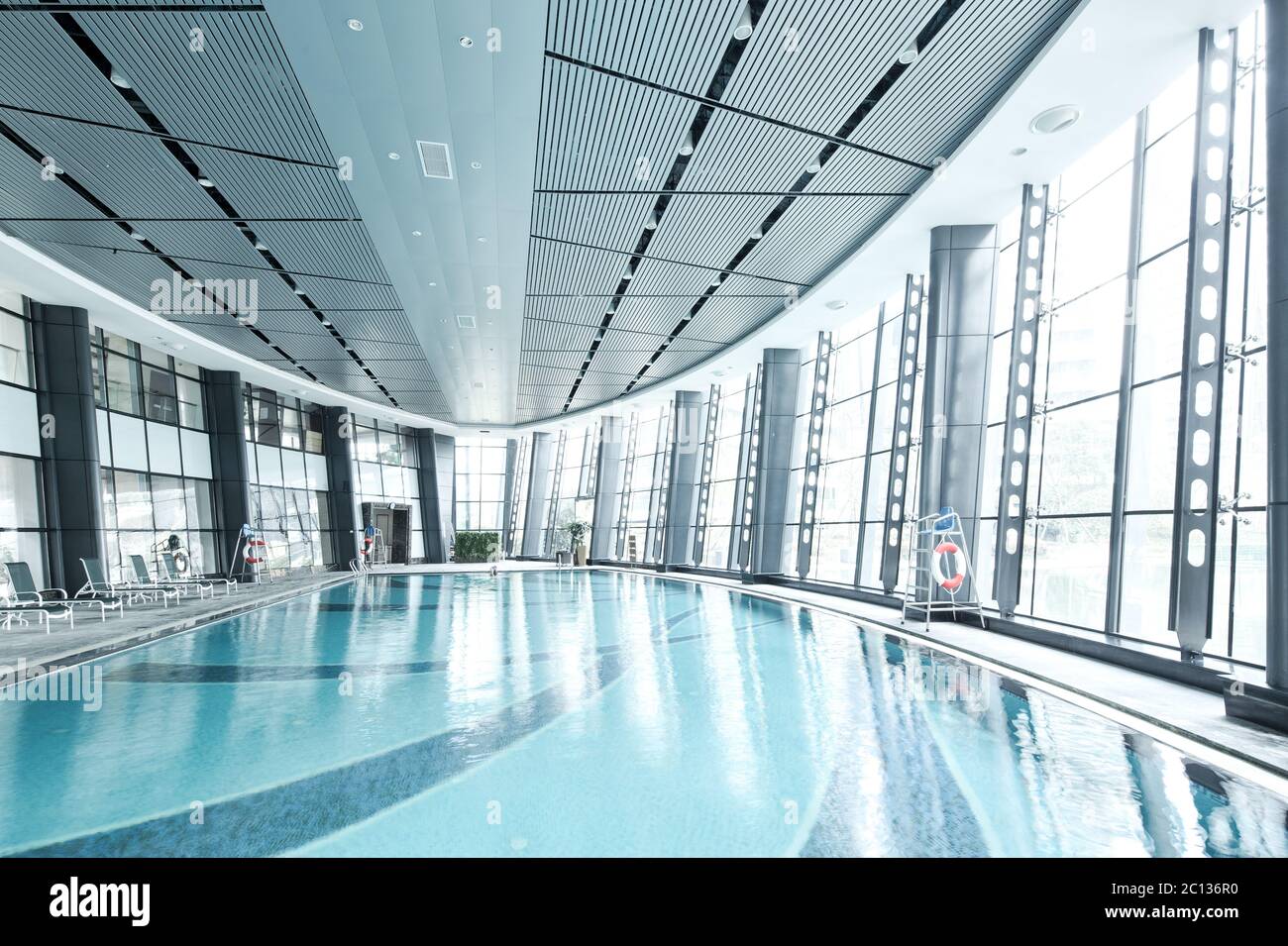 bright indoors swimming pool Stock Photo - Alamy