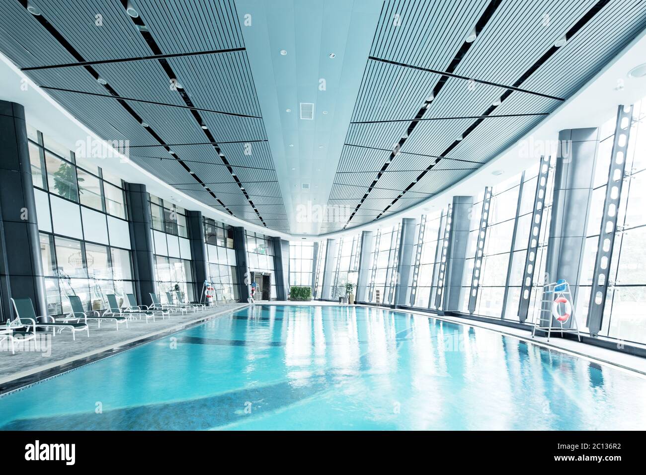 bright indoors swimming pool Stock Photo - Alamy