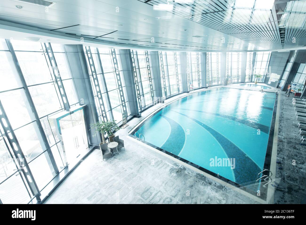 bright indoors swimming pool Stock Photo - Alamy