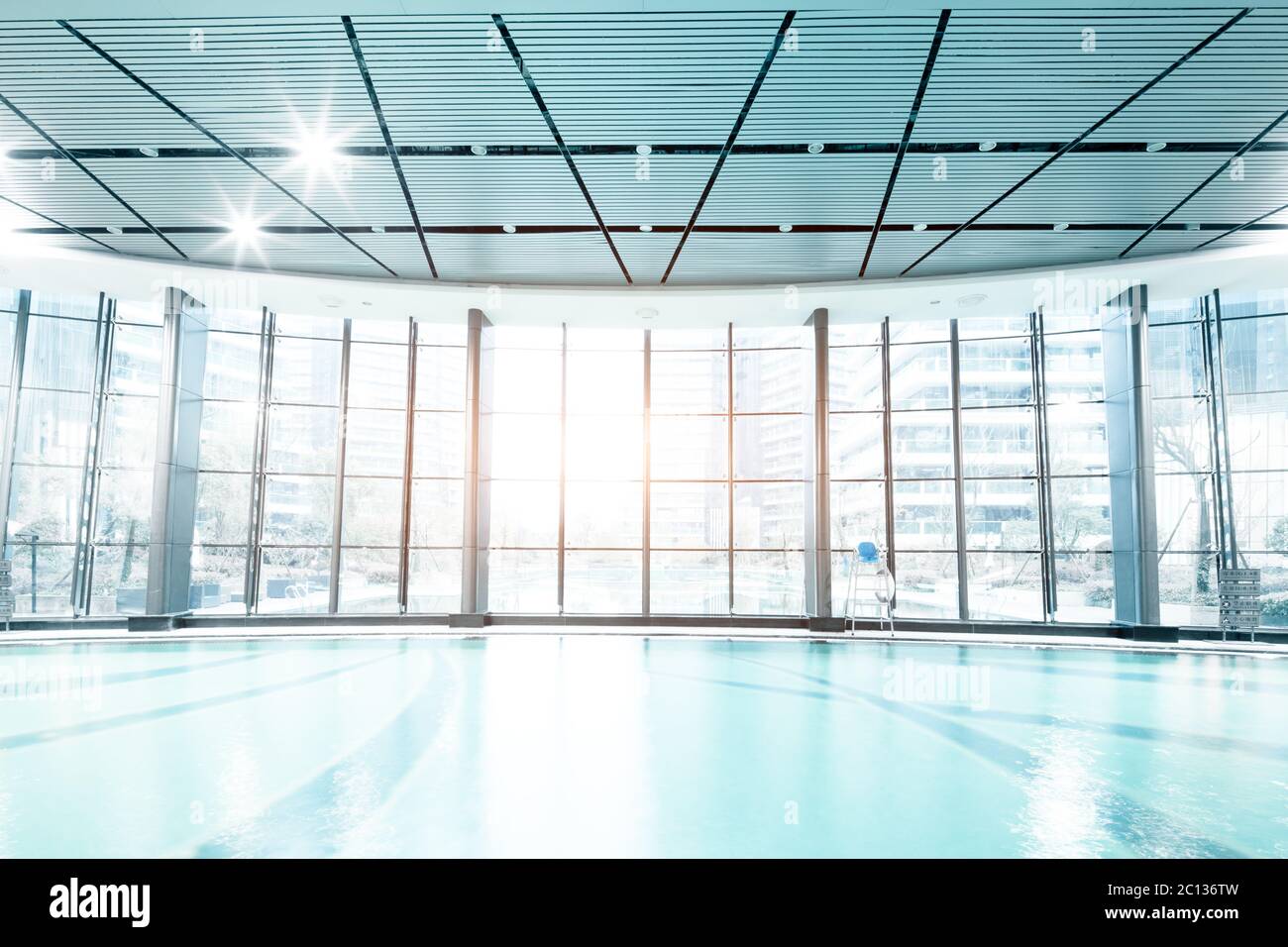 bright indoors swimming pool Stock Photo - Alamy