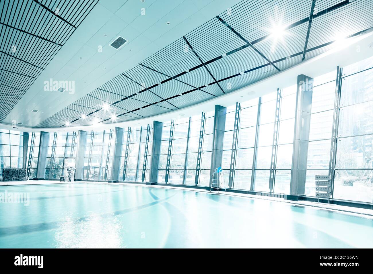 bright indoors swimming pool Stock Photo - Alamy