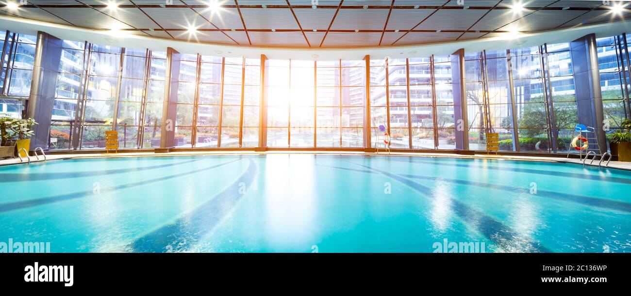 bright indoors swimming pool Stock Photo - Alamy