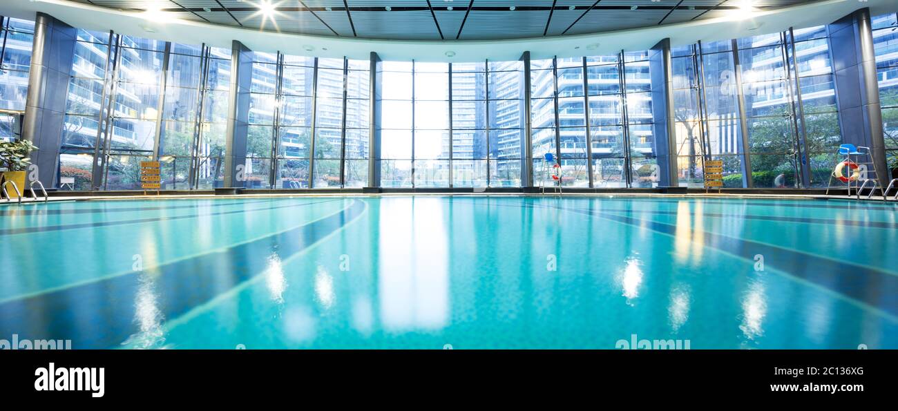 bright indoors swimming pool Stock Photo - Alamy