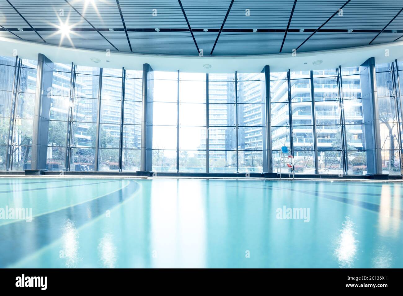 bright indoors swimming pool Stock Photo - Alamy