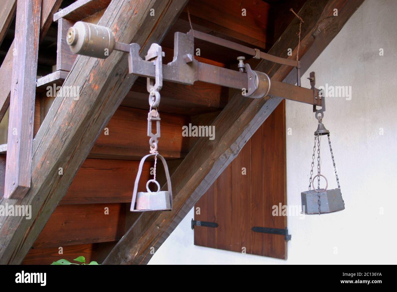 Old balance scale used as decor in Italy's countryside Stock Photo - Alamy