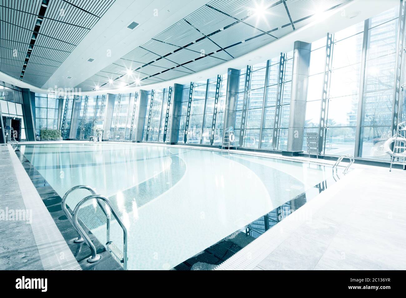 bright indoors swimming pool Stock Photo - Alamy