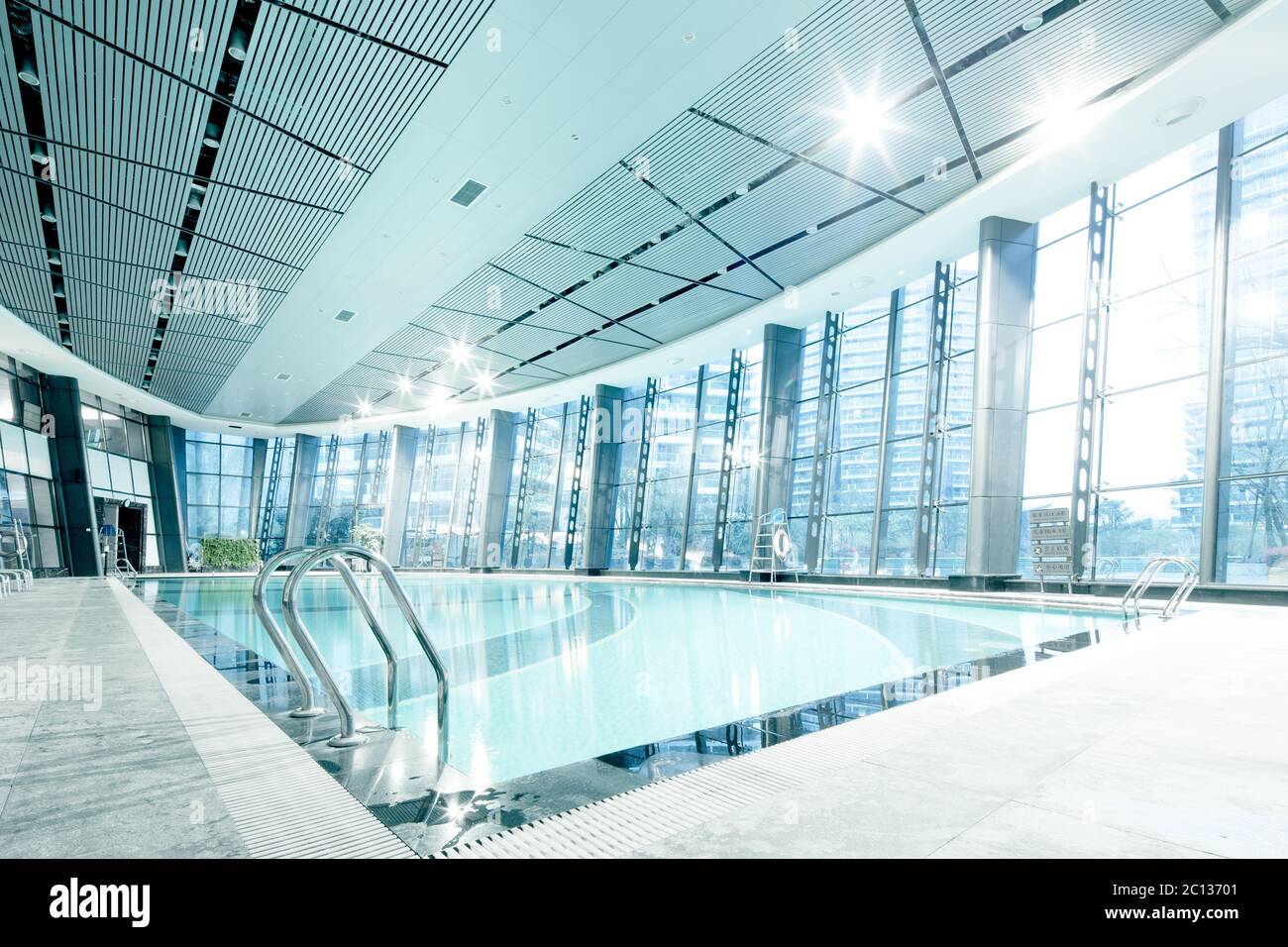 bright indoors swimming pool Stock Photo - Alamy