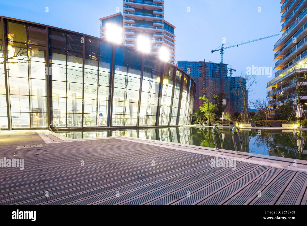 modern buildings near water in hangzhou at twilight Stock Photo - Alamy
