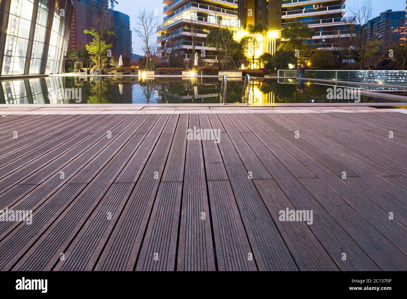 modern buildings near water in hangzhou at twilight Stock Photo - Alamy