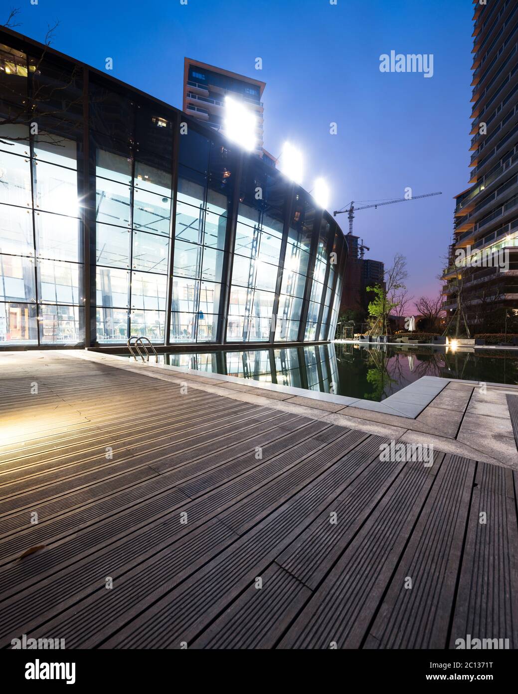 modern buildings near water in hangzhou at twilight Stock Photo - Alamy