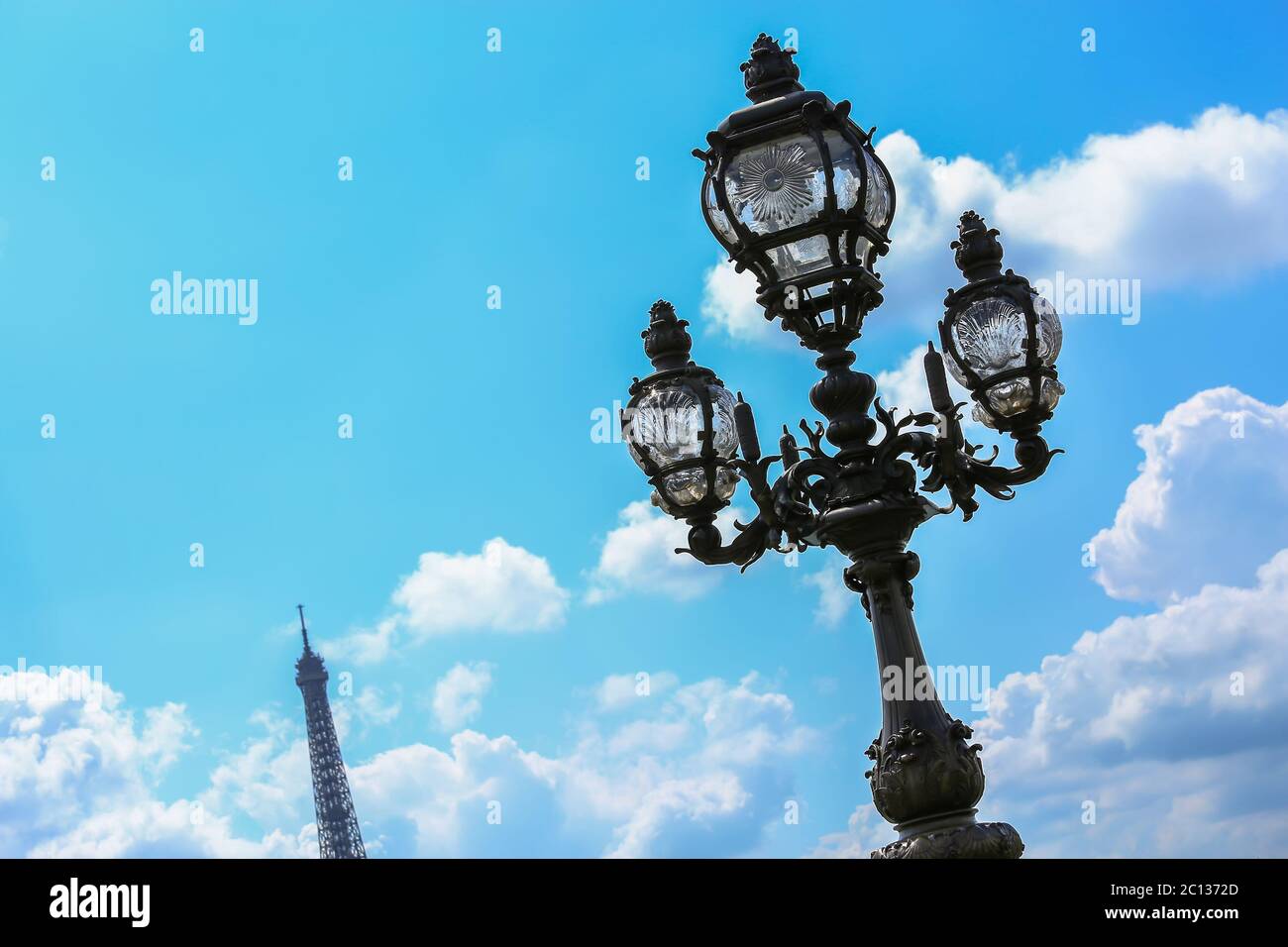 Ornate lamp post along the Pont Alexandre III in Paris Stock Photo - Alamy