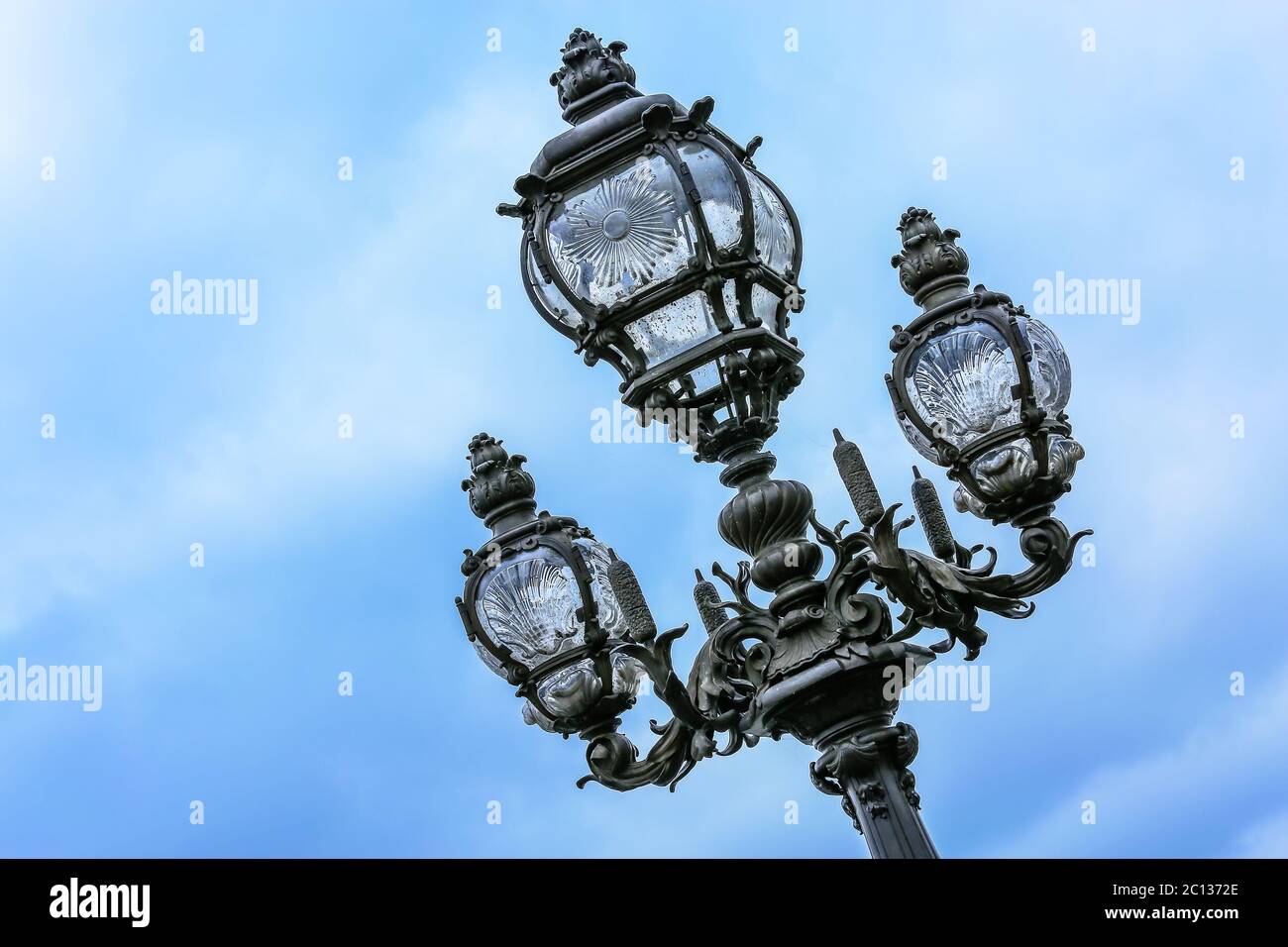 Ornate lamp post along the Pont Alexandre III in Paris Stock Photo - Alamy