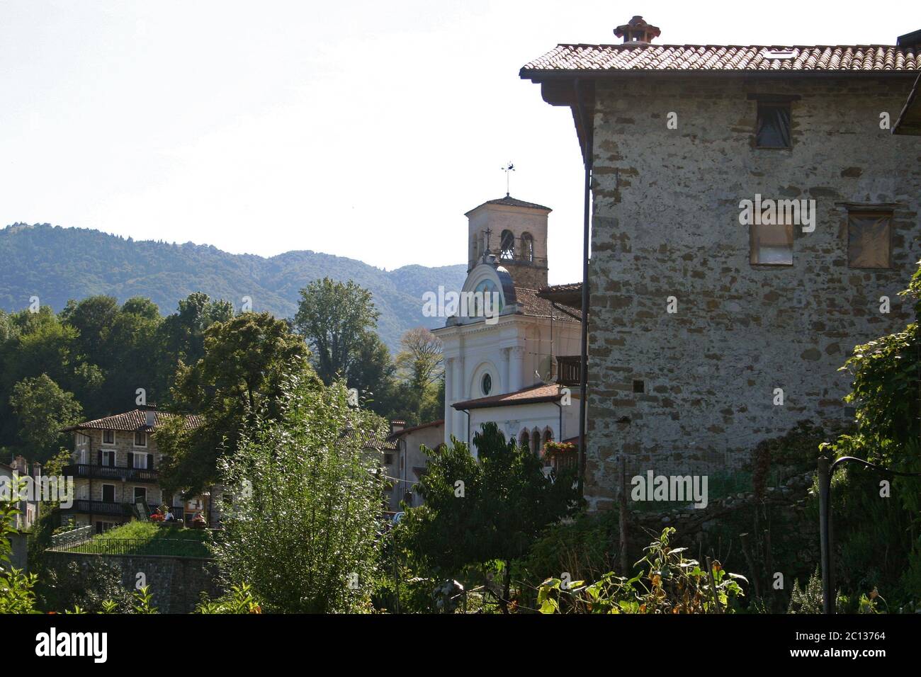 Traditional stone houses and church in the picturesque village of ...