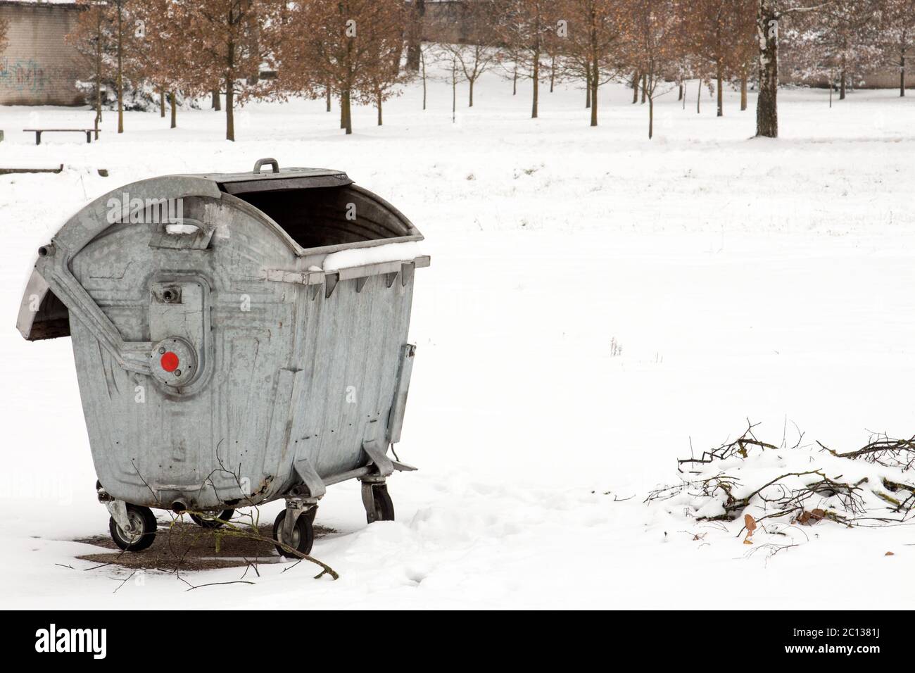 Opened metal garbage container Stock Photo - Alamy