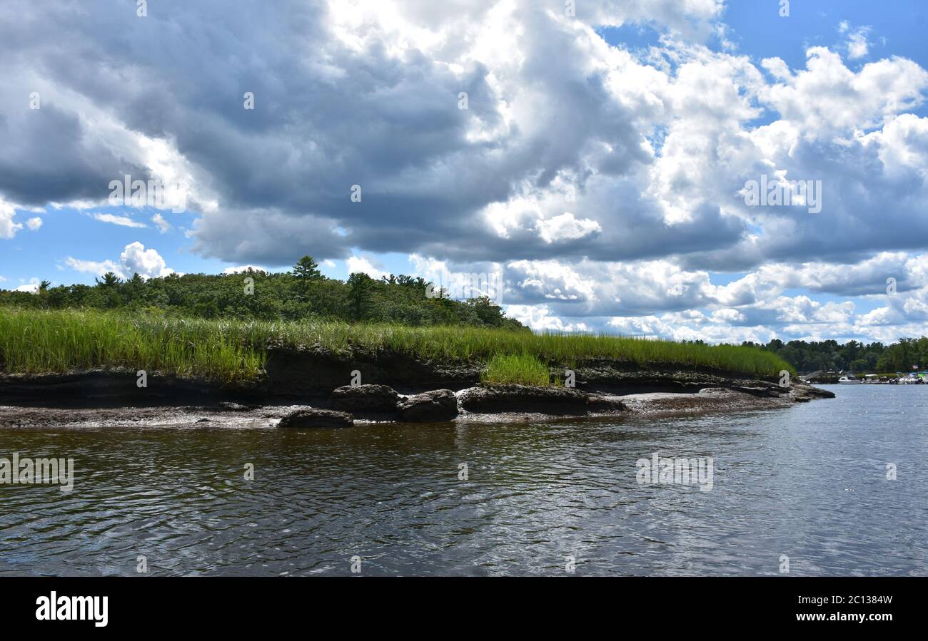 Beautiful stunning tidal river landscape with marsh grass Stock Photo ...