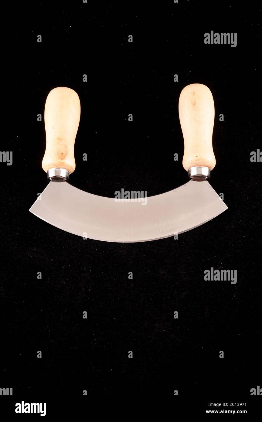 Curved Metallic Knife Tool Stock Photo - Alamy