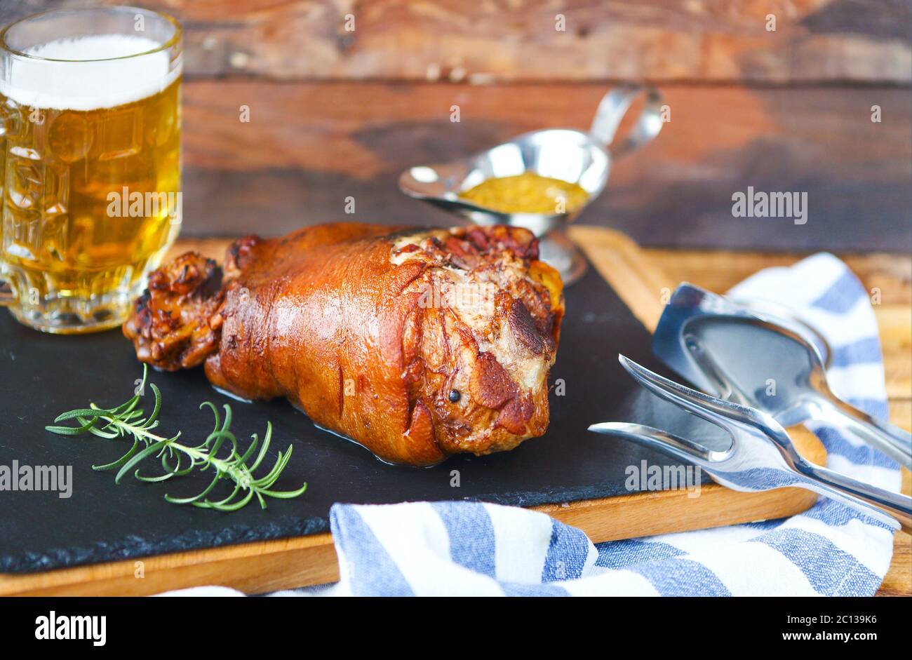 Roasted pork leg (rulka) served with garlic sauce Stock Photo - Alamy