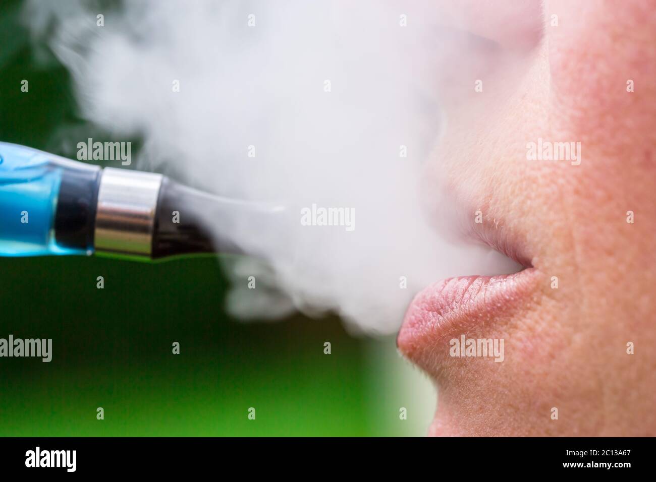 Inhaling smoke hi-res stock photography and images - Alamy